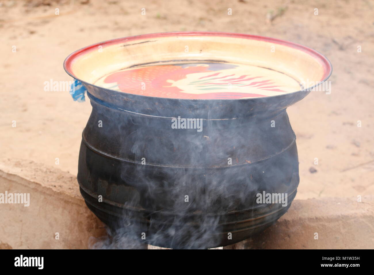 Wood fire cooking africa hi-res stock photography and images - Alamy