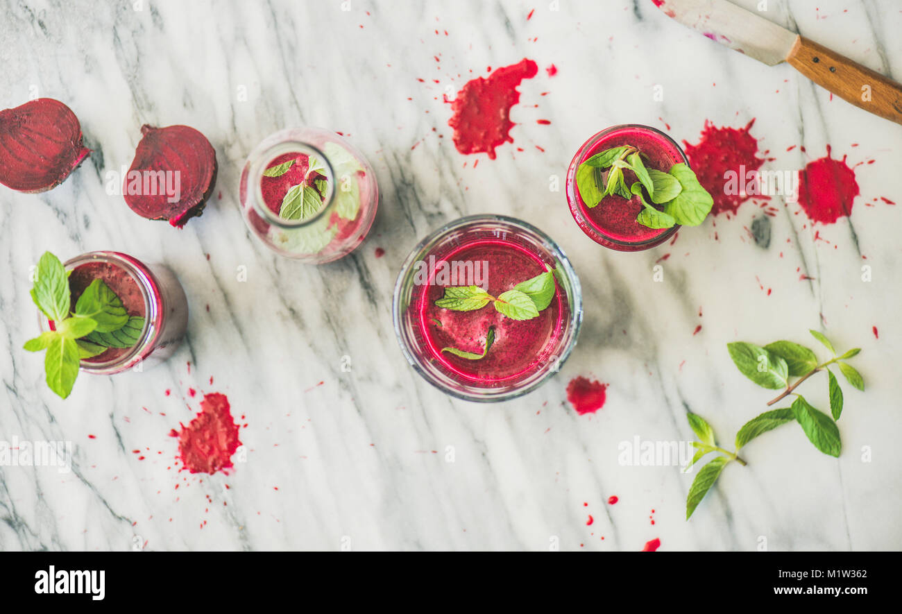 Fresh beetroot smoothie in glasses over marble background Stock Photo ...