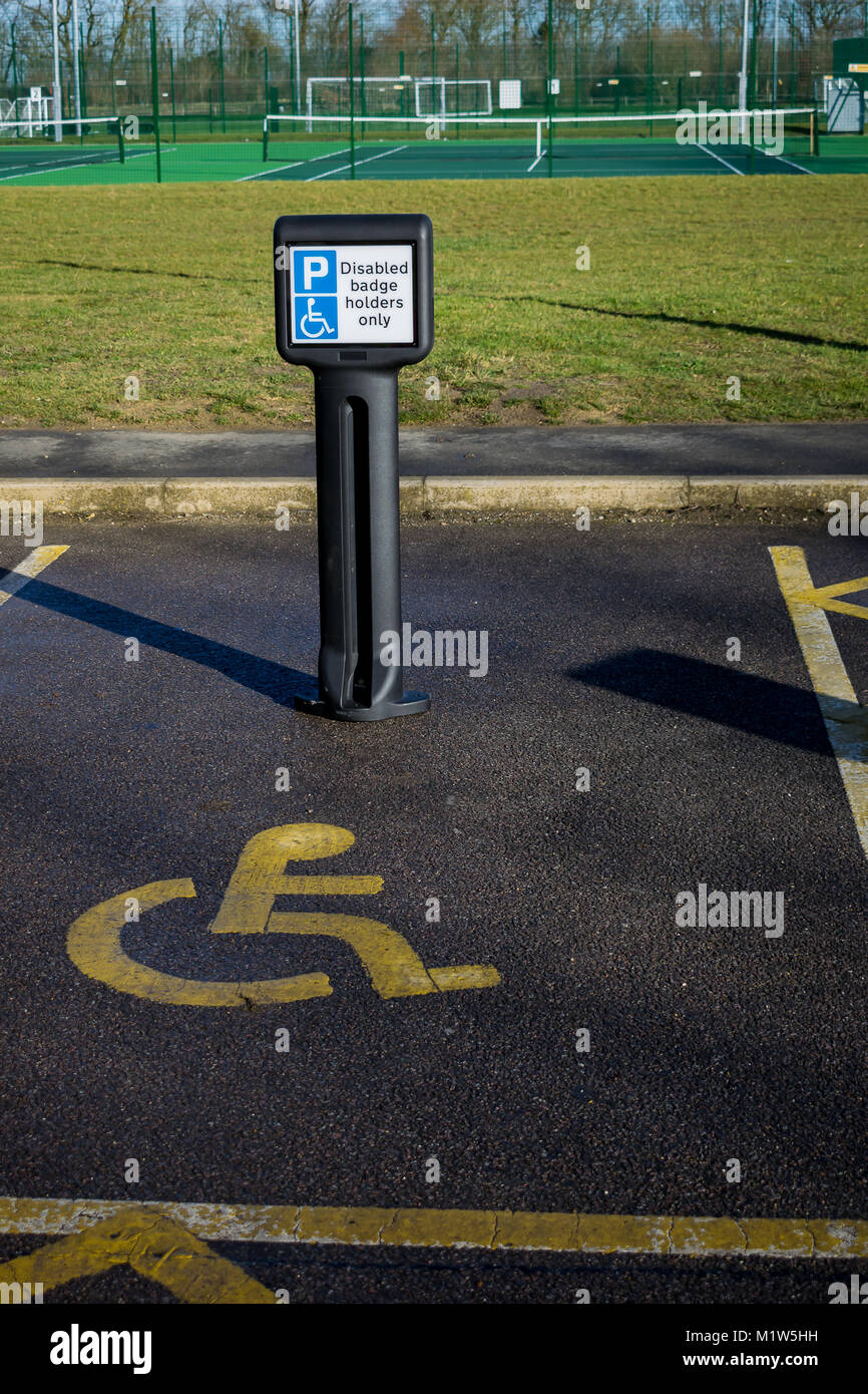 Disabled car park bollard hi-res stock photography and images - Alamy