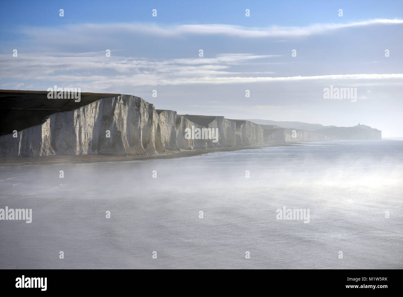 Iconic Seven Sisters chalk cliffs n the South Downs national park on a ...