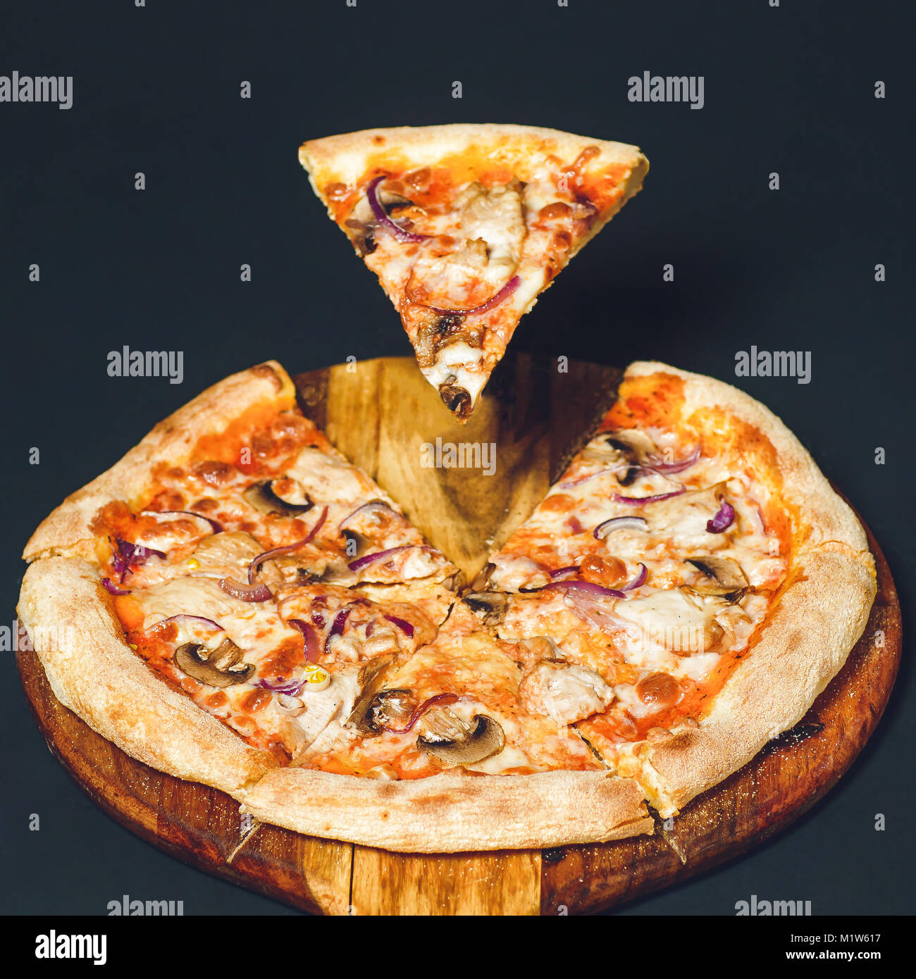 Hot pepperoni pizza flying color food italian Stock Photo - Alamy