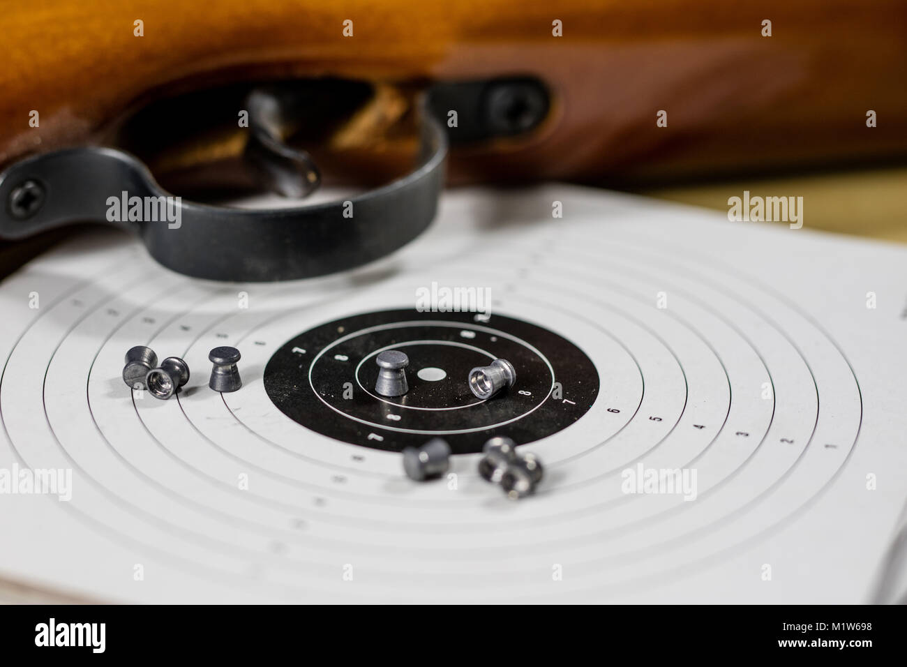 Shooting accessories on a wooden table in a shooting range. Shield and ...