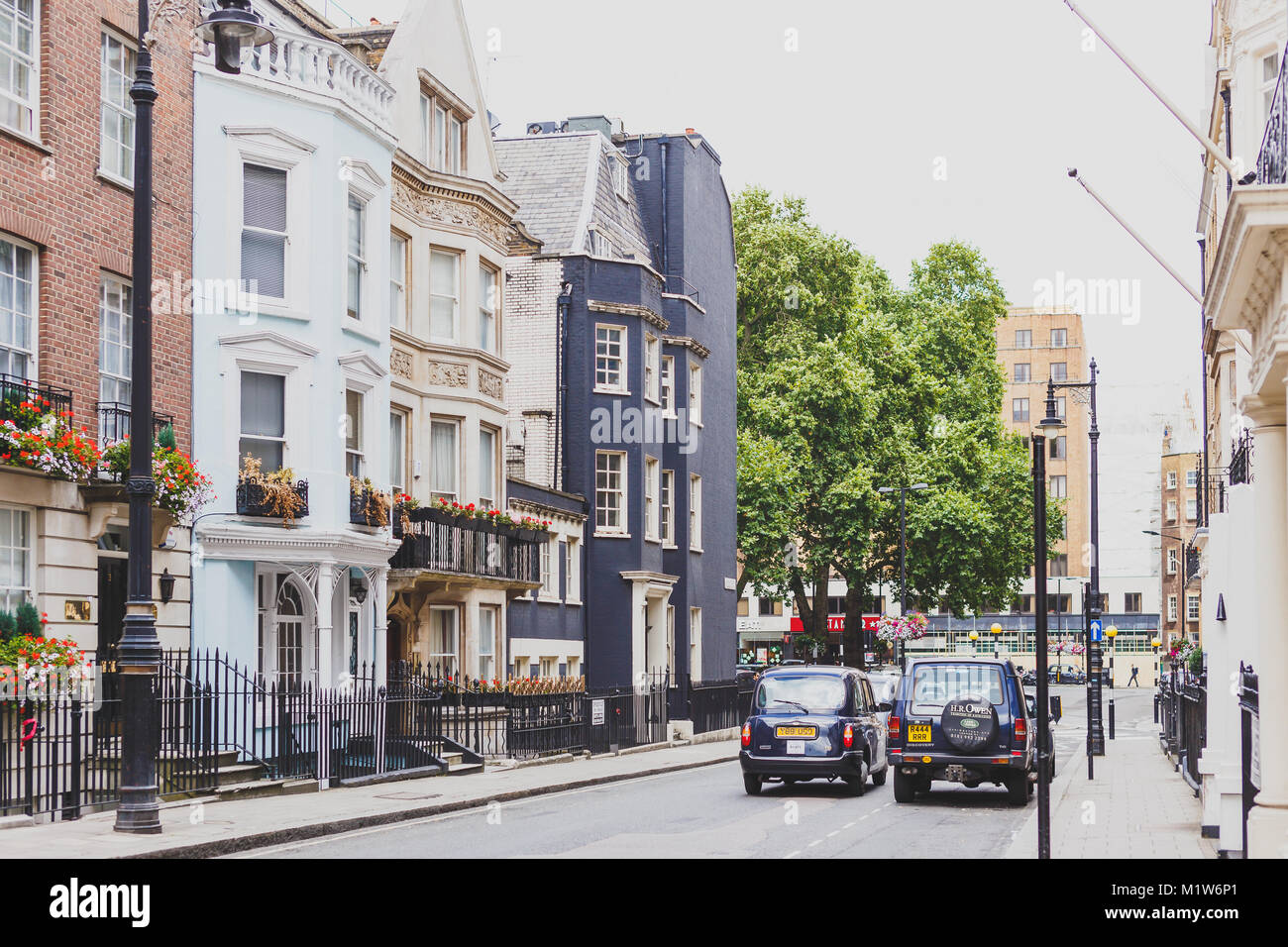 LONDON, UNITED KINGDOM - August 2nd, 2014: beautiful streets with ...