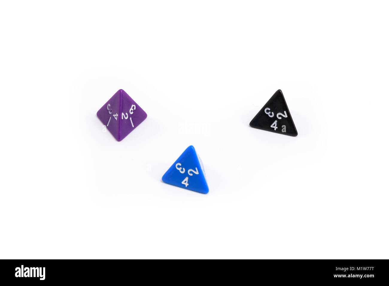 3 d4 dice isolated on white Stock Photo - Alamy