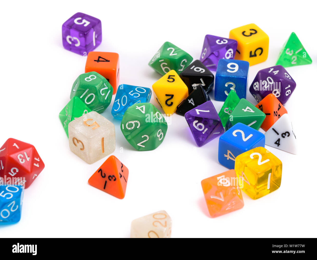 Bunch of assorted game dice on white Stock Photo - Alamy