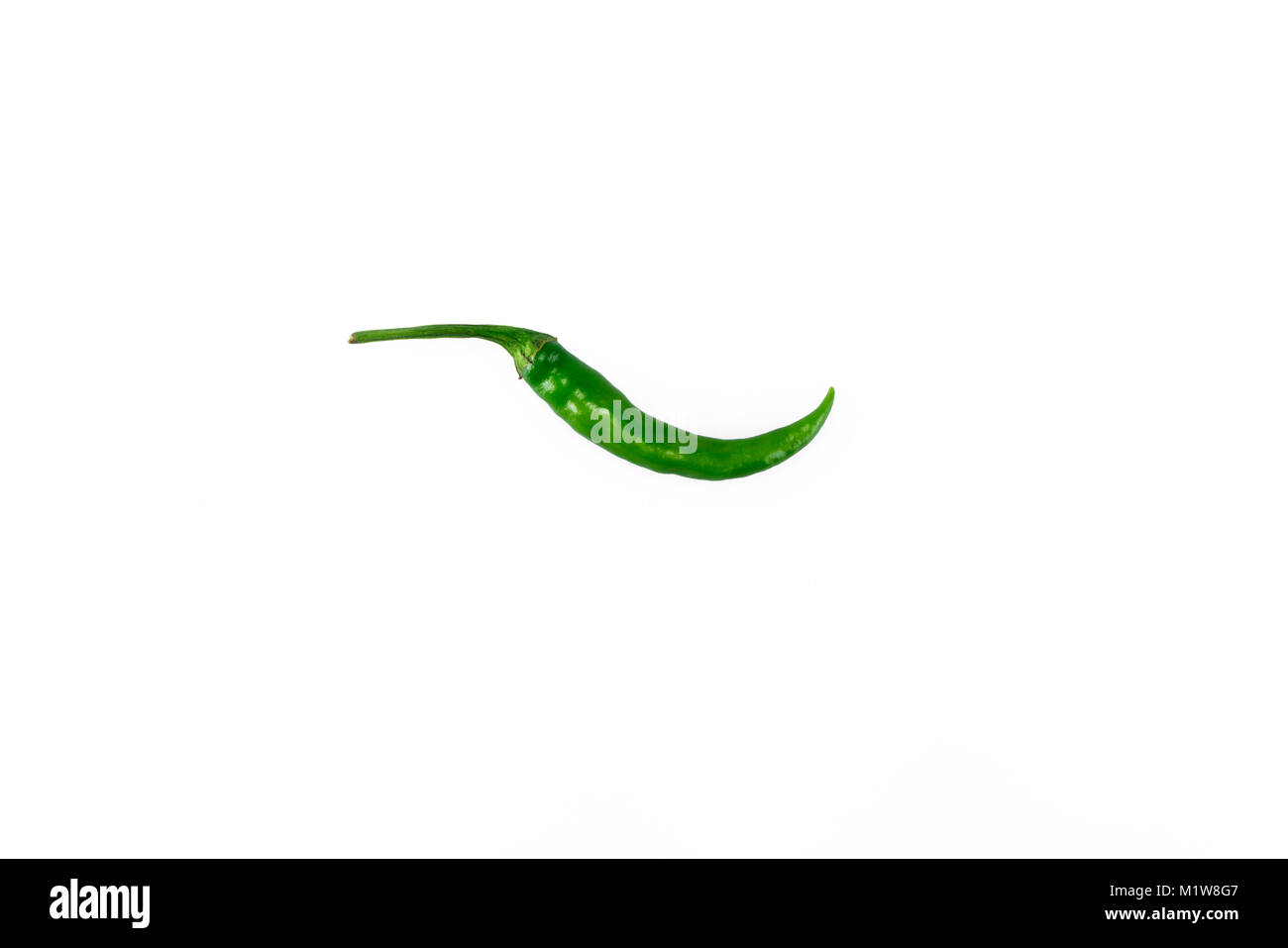 A piece of fresh organic hot chili bullet green isolated in white ...