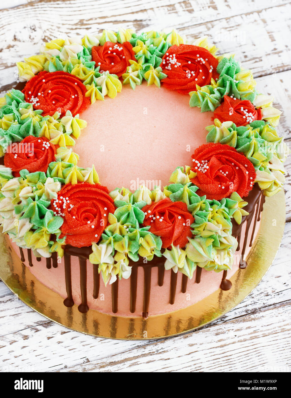 Birthday cake with flowers rose on white background Stock Photo - Alamy