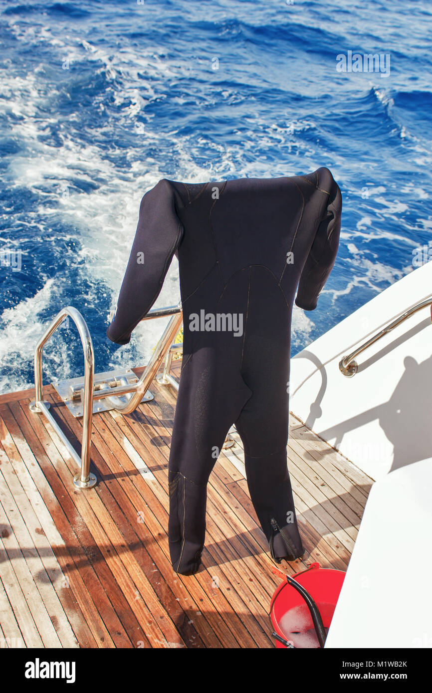 Equipment for scuba diving on boat of ship Stock Photo - Alamy
