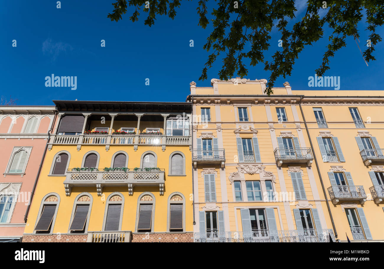 Colourful facade of traditional buildings in Como, Italy Stock Photo ...