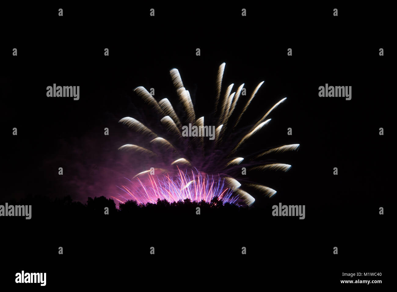 Huge colourful explosion of fireworks in different colours at magic ...