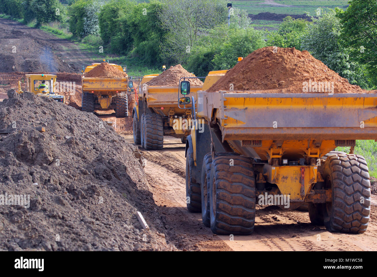 Loaded dumper truck hi-res stock photography and images - Alamy