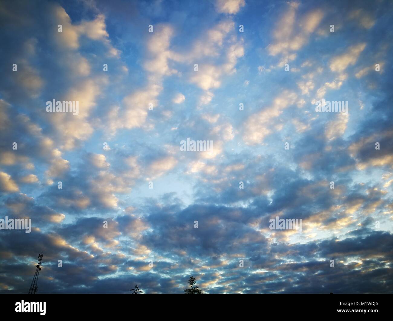 Fluffy cloudy sky in rainy season Stock Photo - Alamy