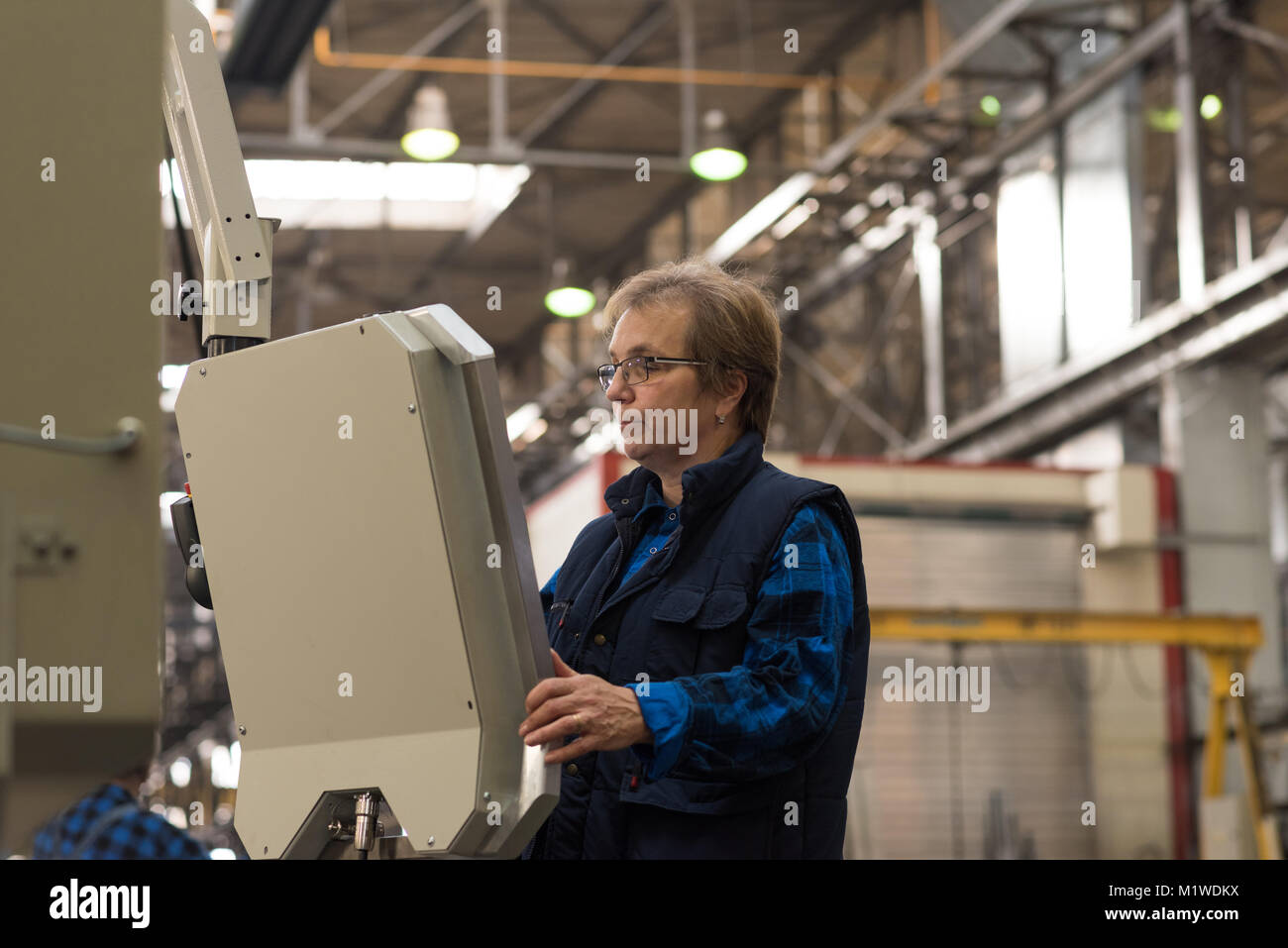 Standing expertise control panel operating technology hi-res stock ...