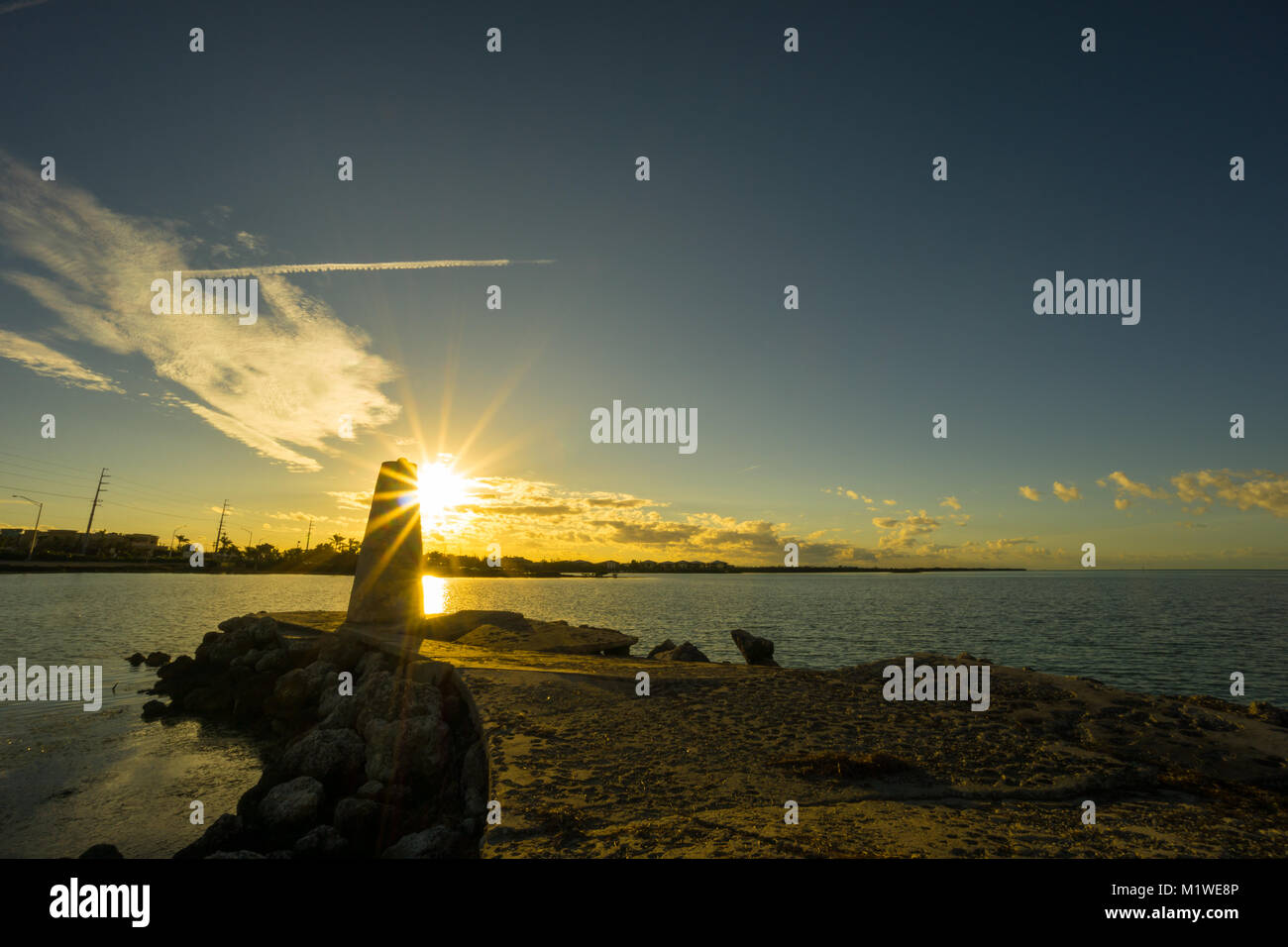 USA, Florida, Sunset behind stone mole damaged by hurricane irma Stock ...