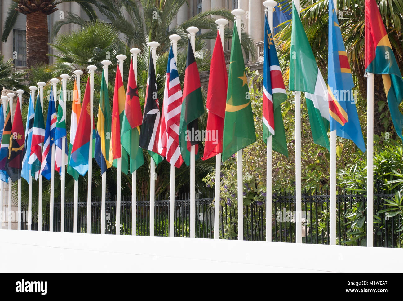 International flags in front of institutional building Stock Photo - Alamy