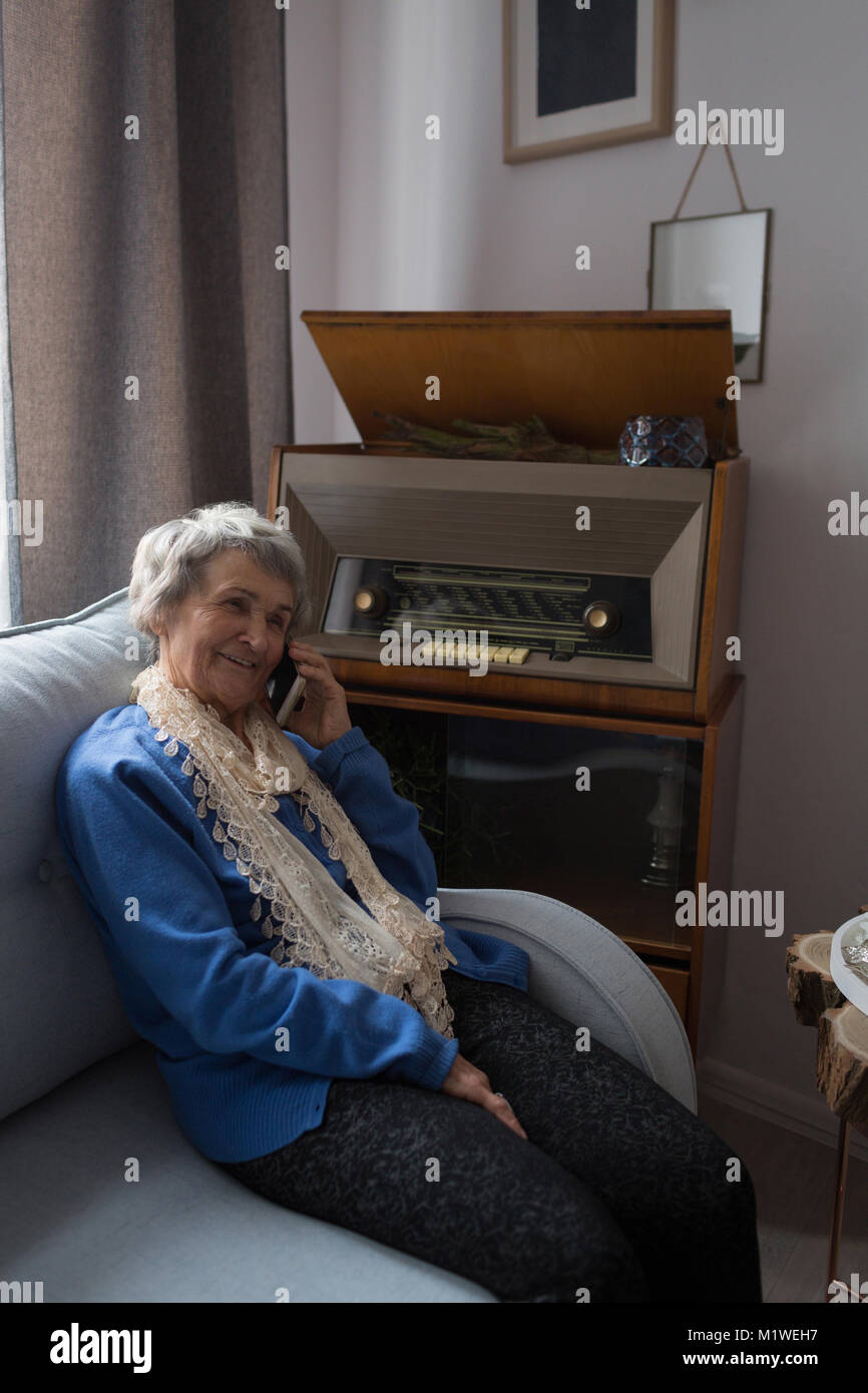 Senior woman talking on mobile phone Stock Photo - Alamy