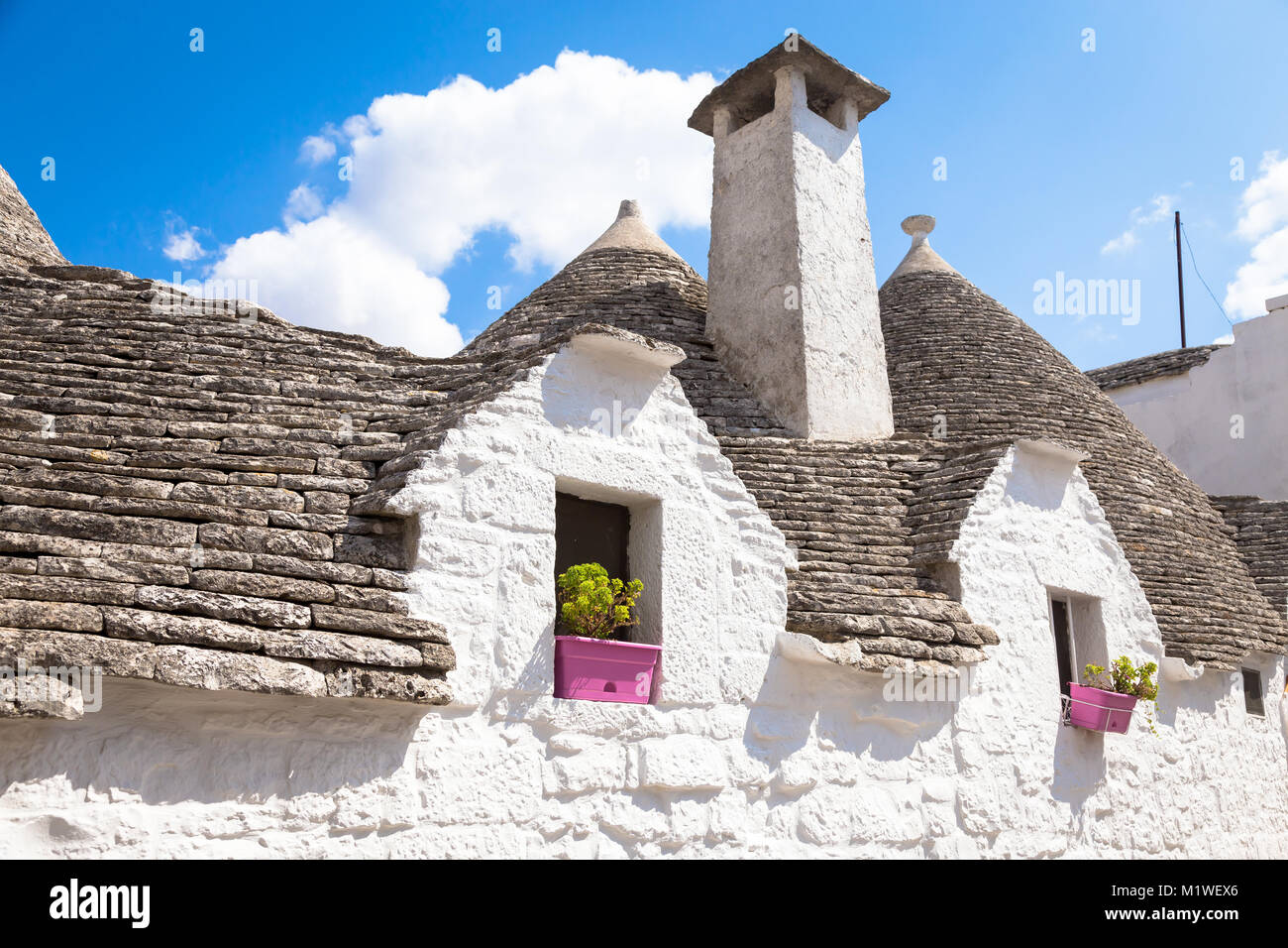 Alberobello, Puglia Region, South of Italy. Traditional roofs of the ...