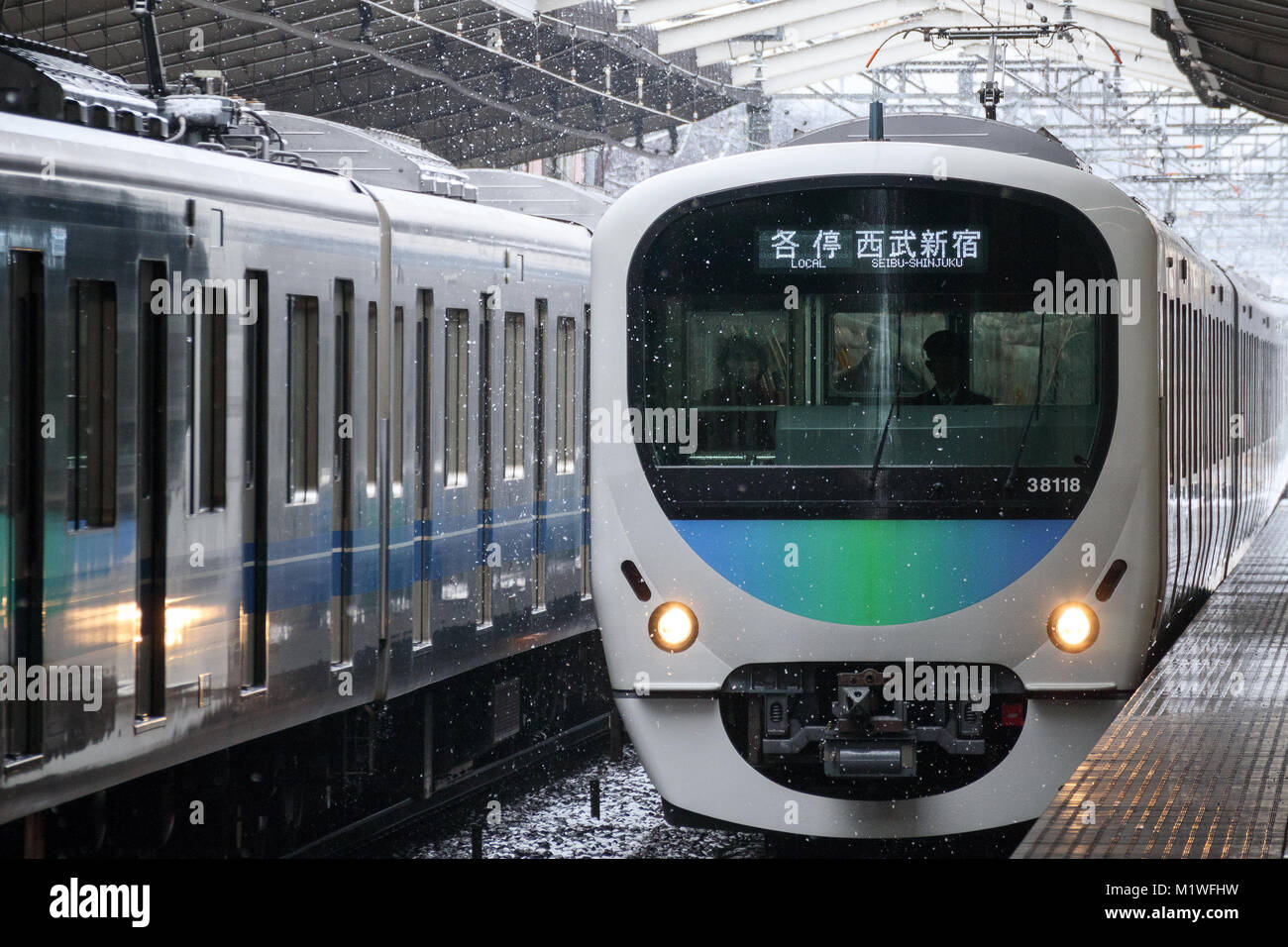 Tokyo, Japan. 2nd Feb, 2018. A Seibu train arrives at Musashi-Seki ...