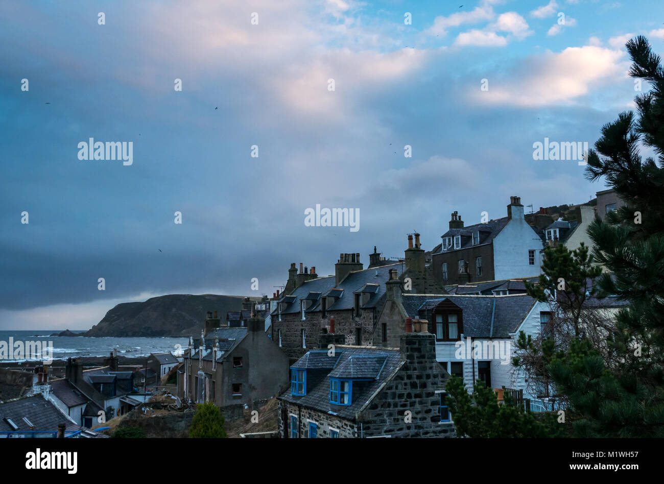 Gardenstown, Aberdeenshire, Scotland United Kingdom. Blue Winter sky at ...