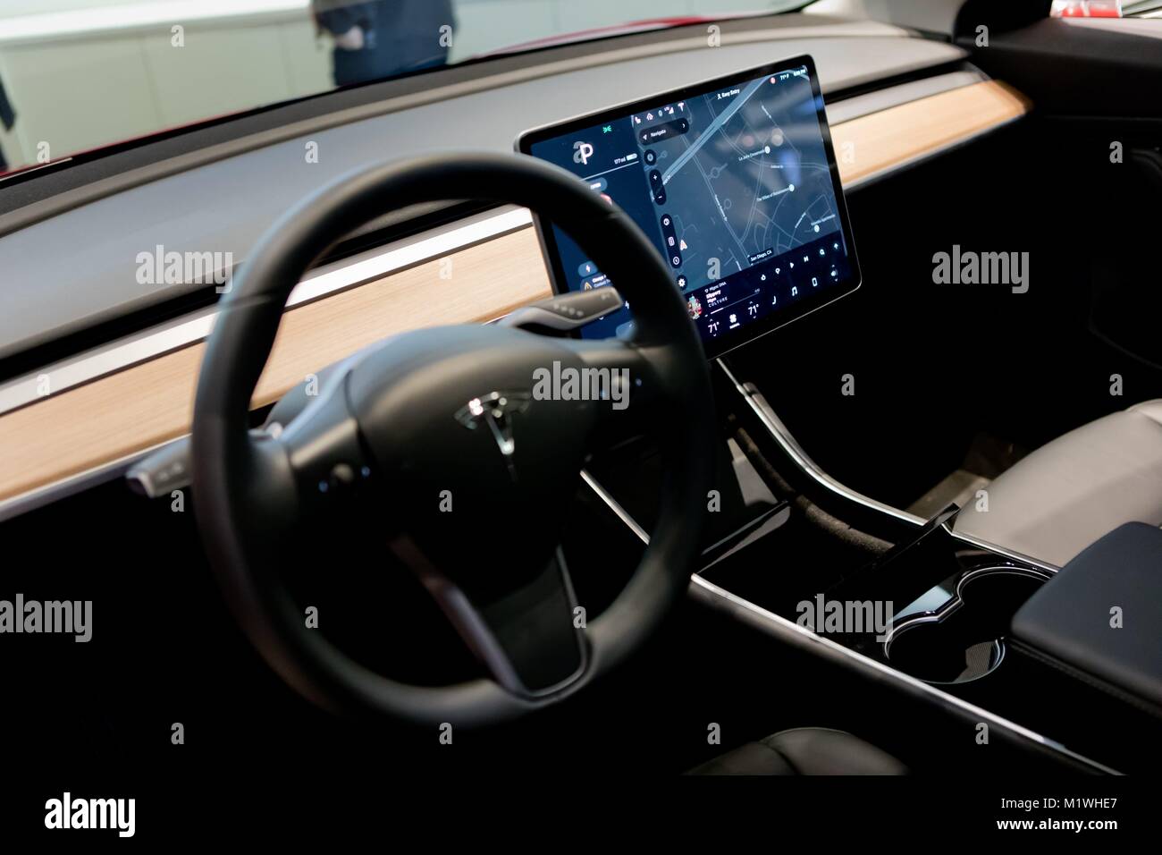 Instead of a classic dashboard the Model 3 comes with a center ...