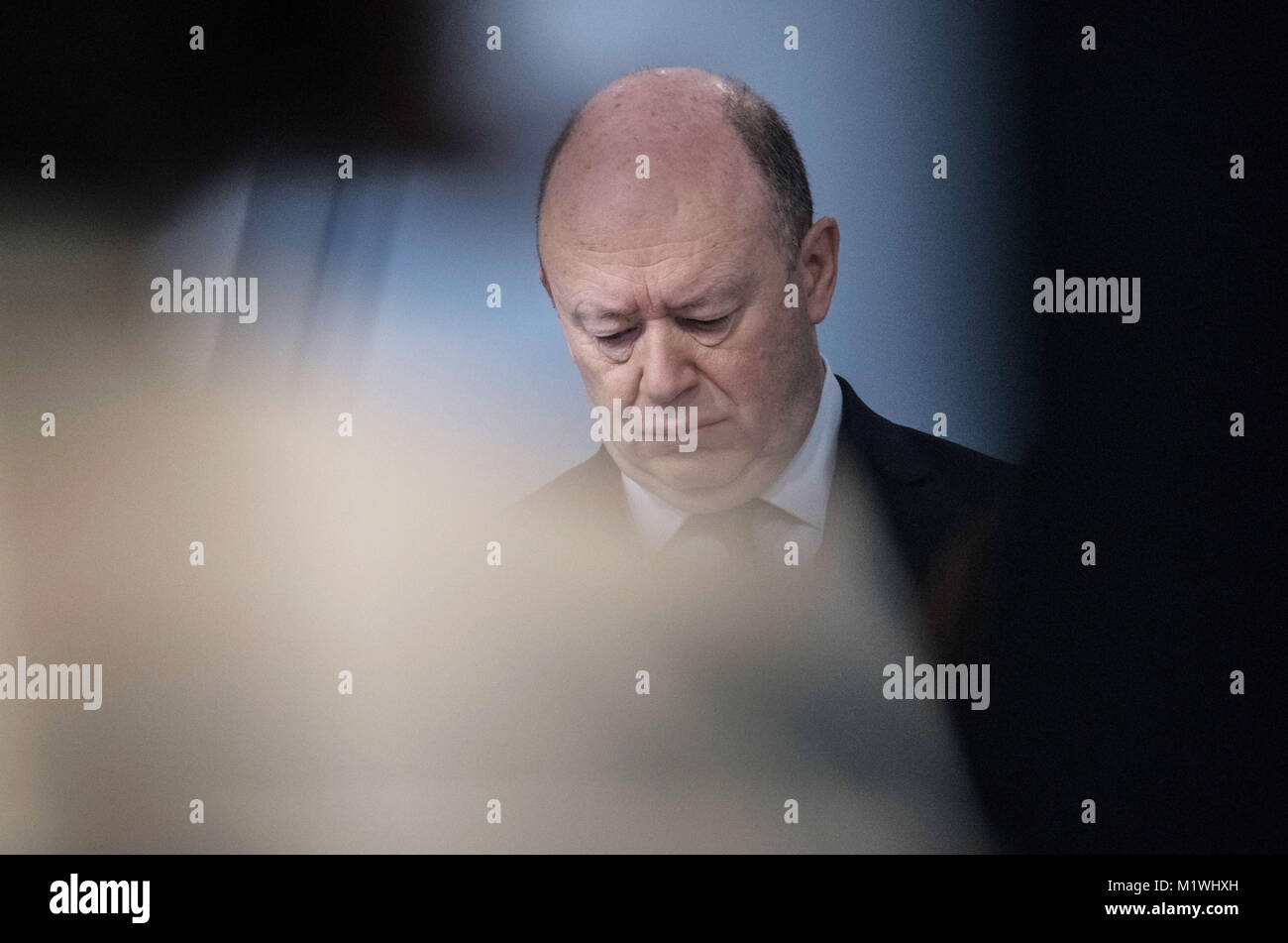 John Cryan, CEO of Deutsche Bank, attends a press conference in ...