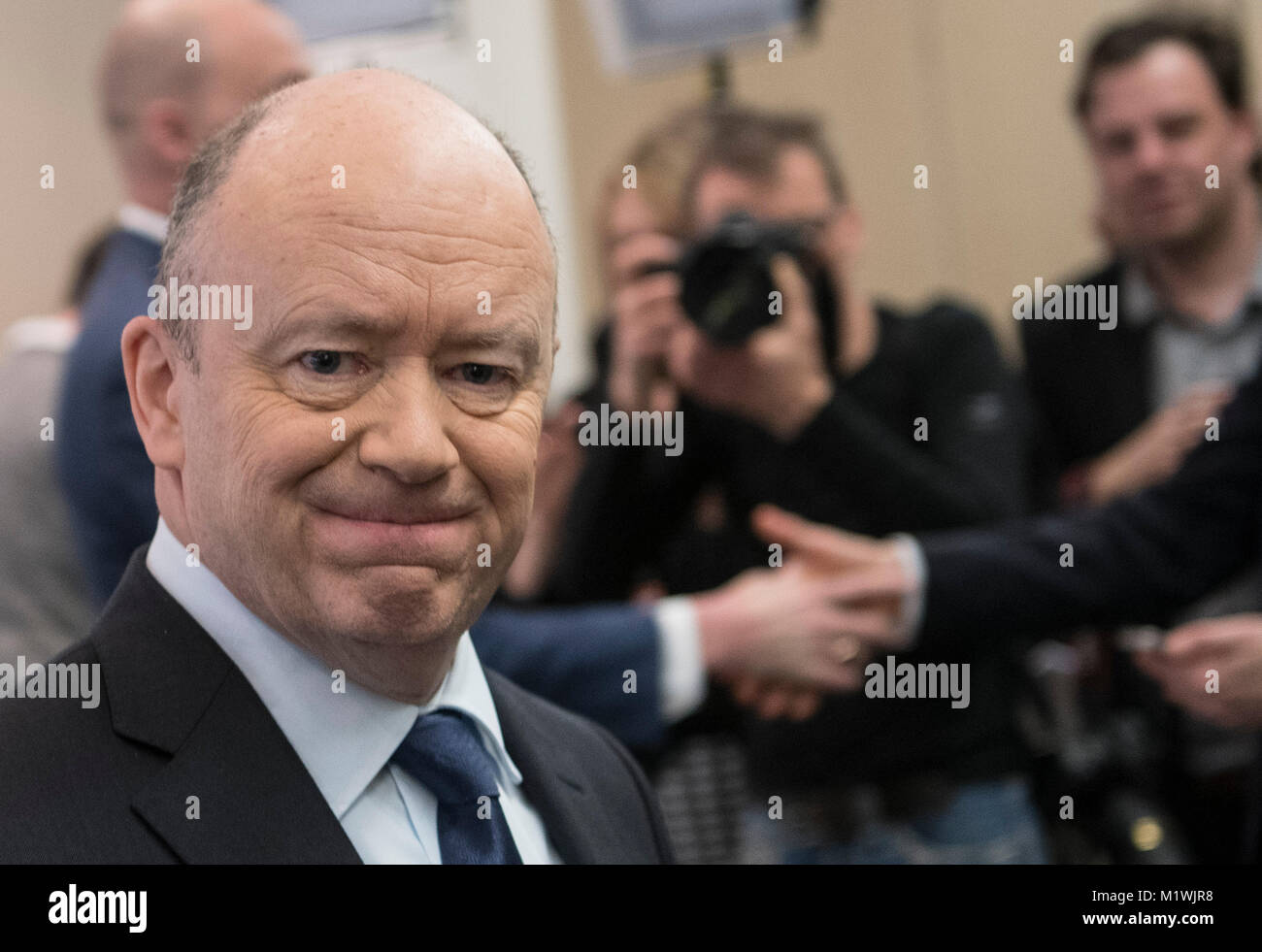 John Cryan, CEO of Deutsche Bank, gives a television interview after ...