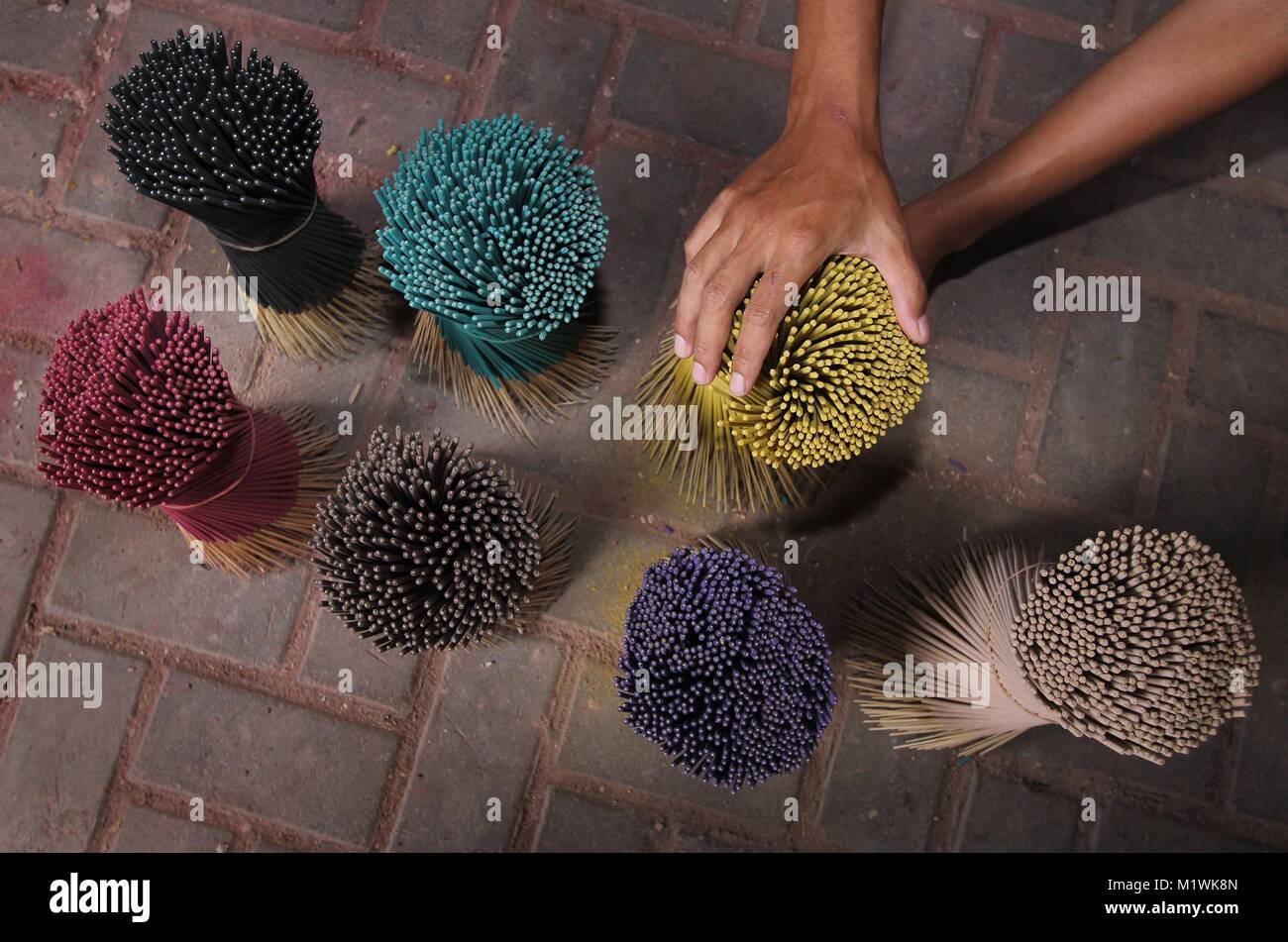Malang, Indonesia. 2nd Feb, 2018. A worker works at a traditional ...