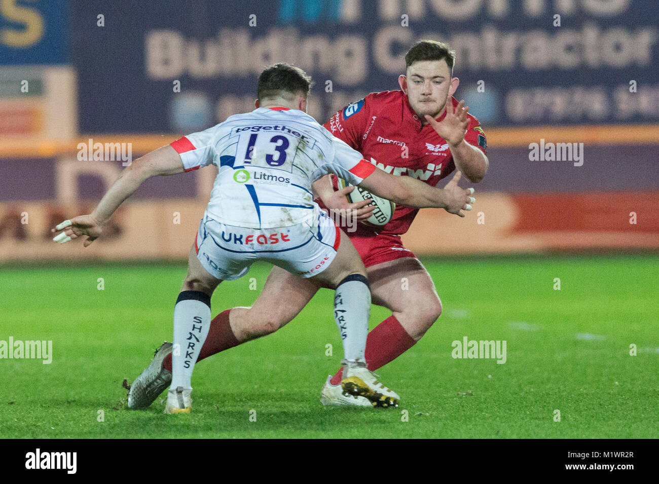 Scarlets centre Scott Lloyd in action against Sale Sharks in the Anglo ...