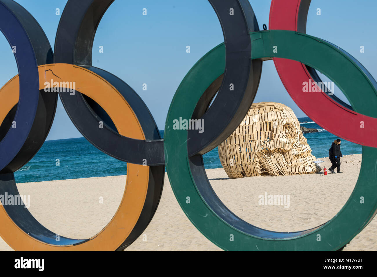 Gangneung, South Korea. 3rd Feb, 2018. Passers-by take pictures of the ...