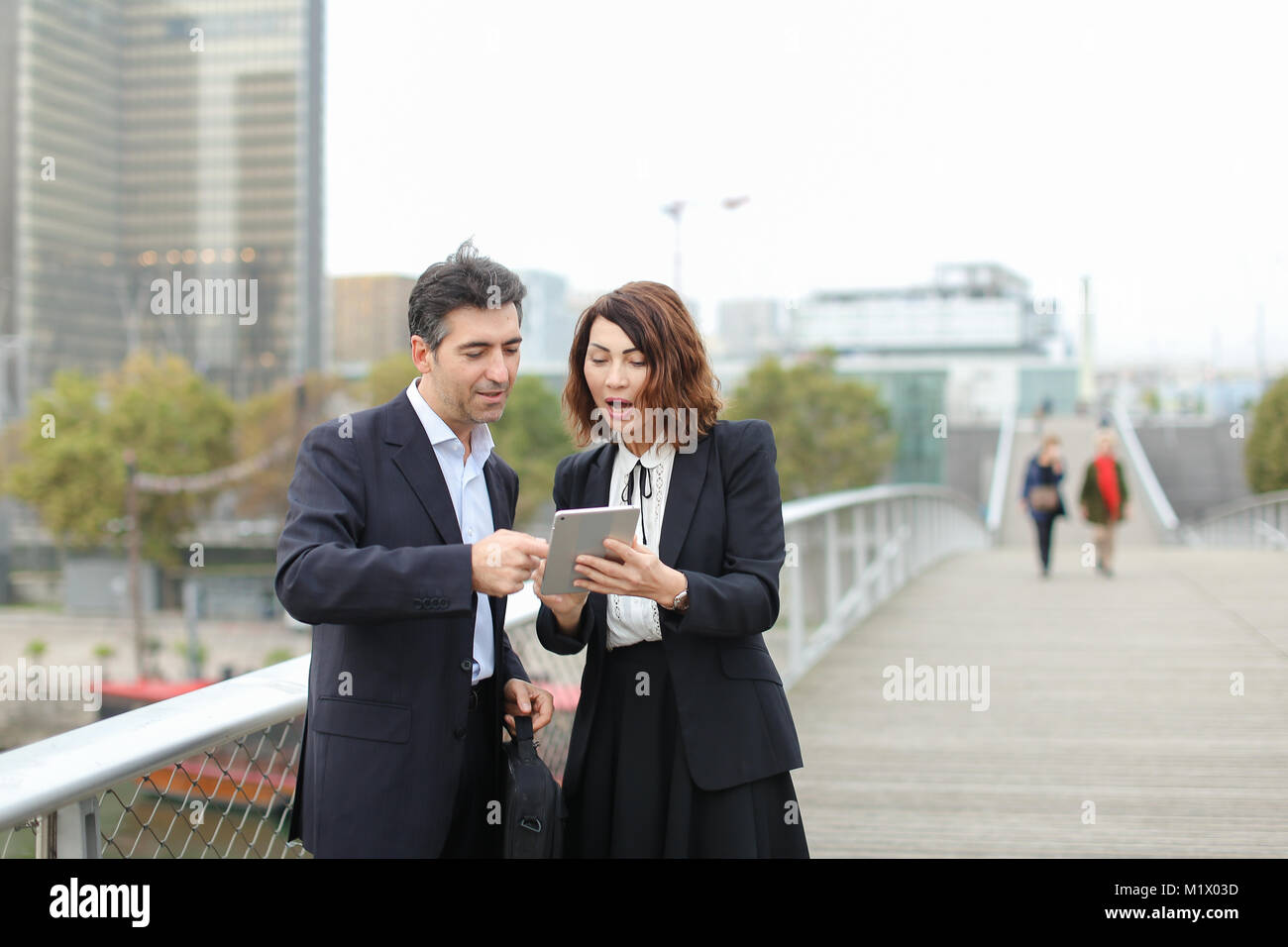 Married business couple make purchases by credit card Stock Photo - Alamy