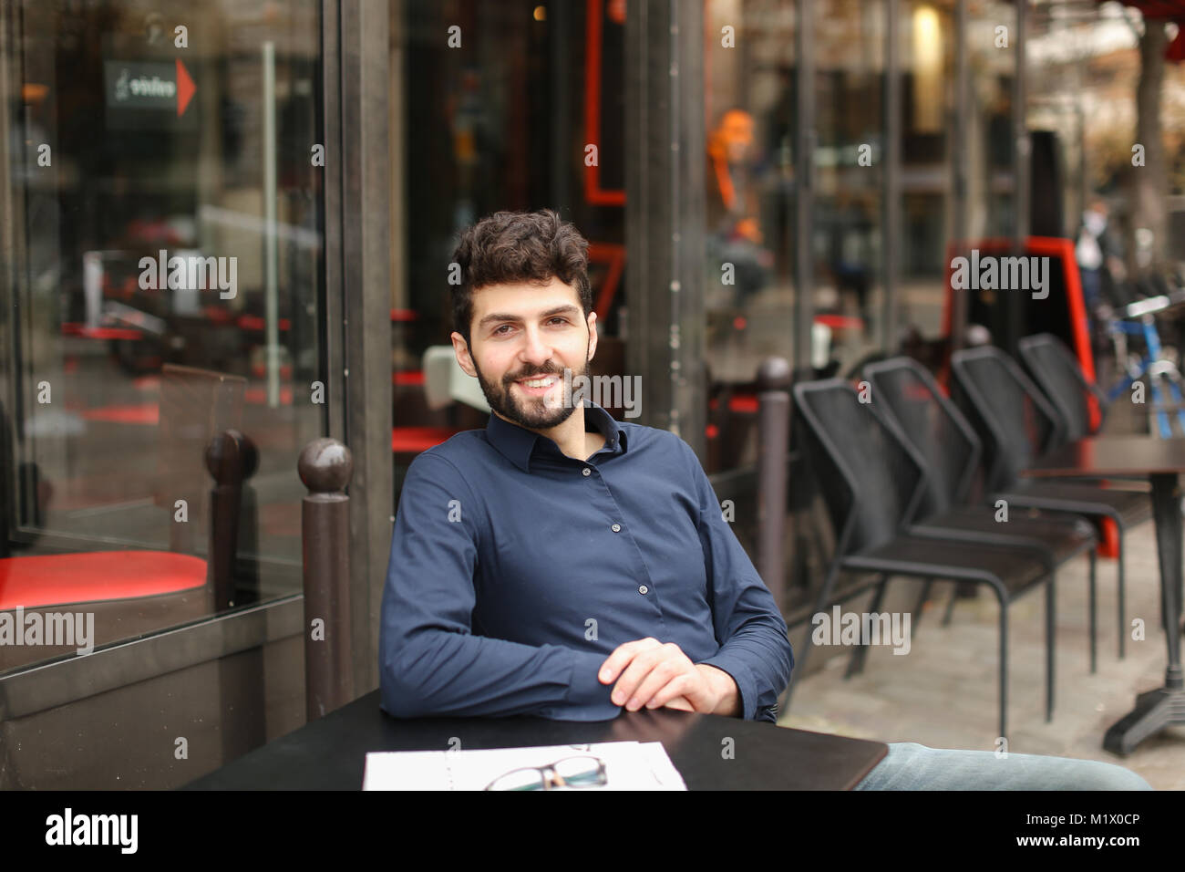Male model with close up face looking at camera and smiling in Stock ...