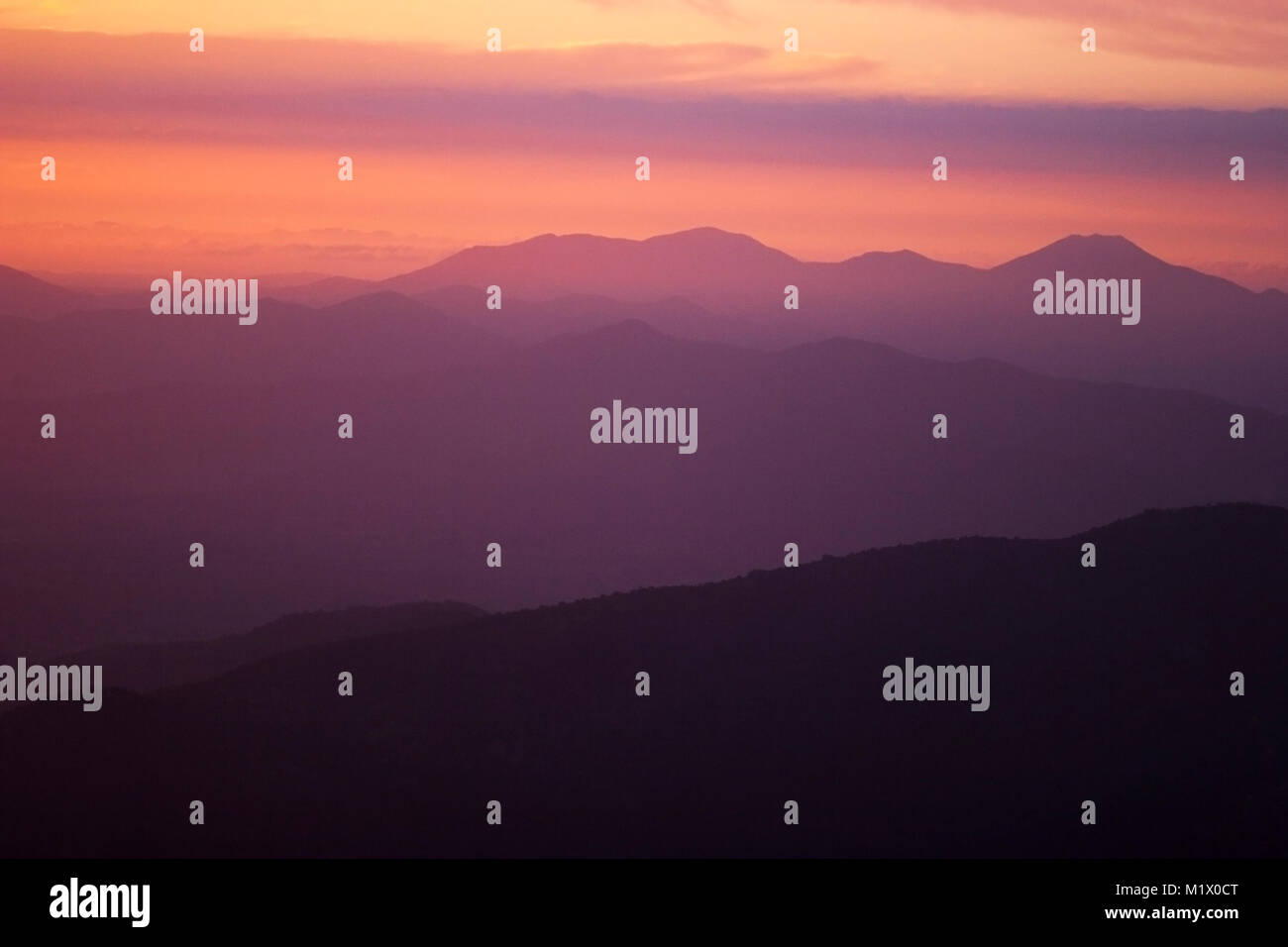 Andes Mountains with colorful sky at sunset, Chile Stock Photo - Alamy