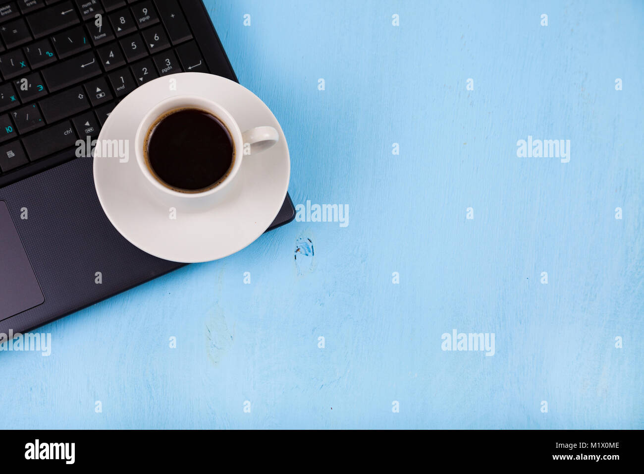 Cup of coffee on a laptop. Coffee break Stock Photo - Alamy