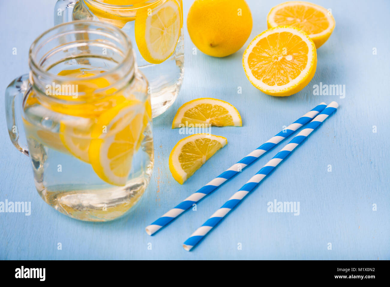 Refreshing ice cold water with lemon ready to drink. Concept of diet. Diet for weight loss Stock ...