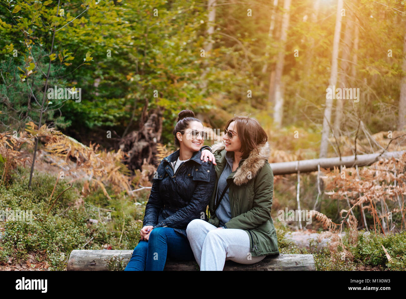 Women sat down hi-res stock photography and images - Alamy