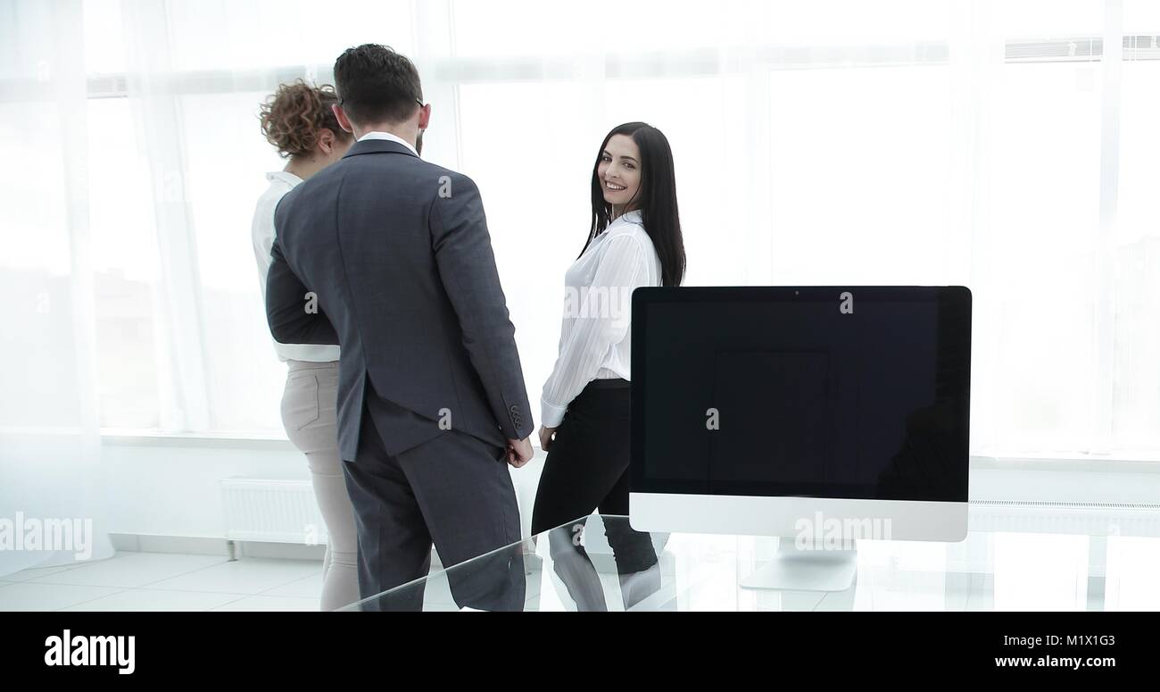 company employees standing in a modern office Stock Photo - Alamy