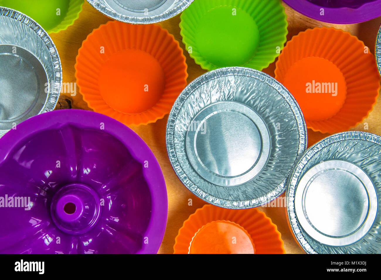 Colourful silicone form for cooking muffin and cupcake Stock Photo - Alamy