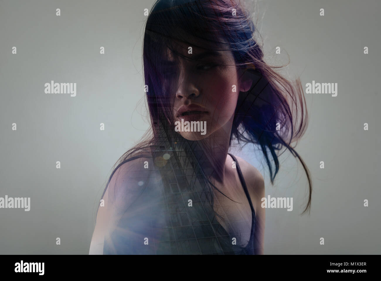 Cute thoughtful girl looking aside turning her head right Stock Photo ...