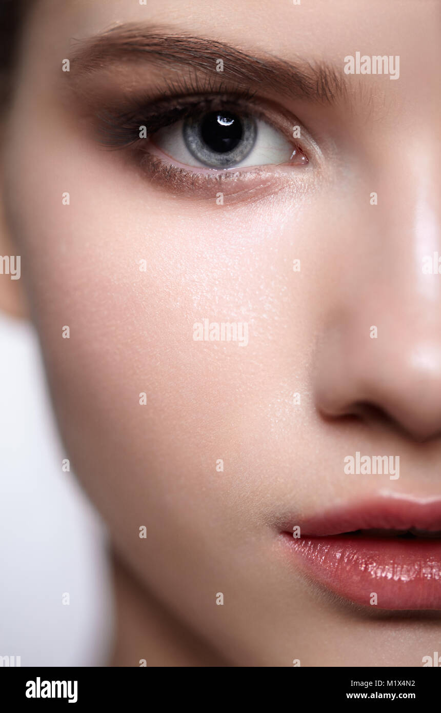 Half face teen female beauty portrait with day beauty makeup Stock ...