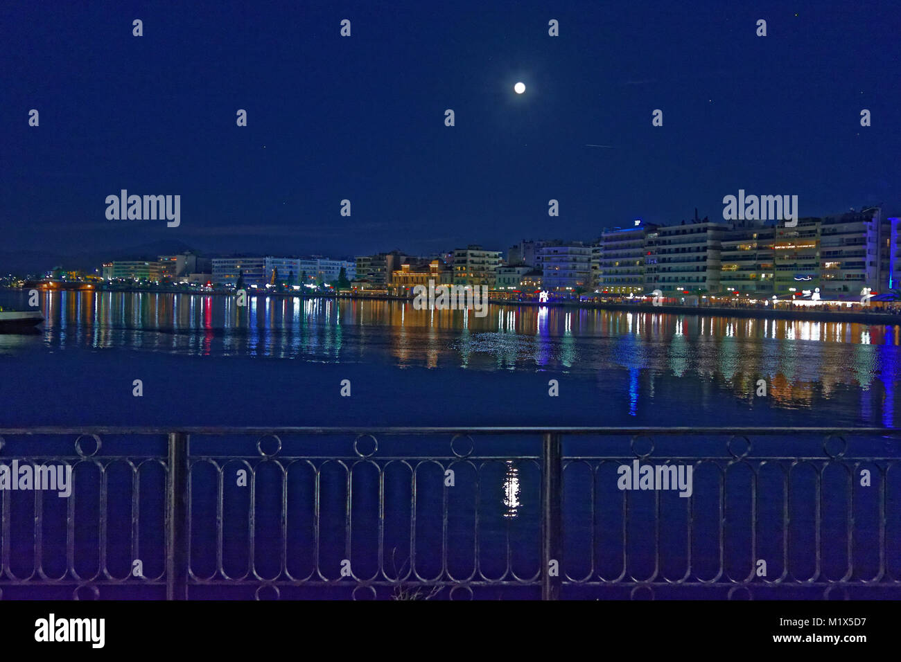 The moon from the old bridge of Chalkis Stock Photo - Alamy