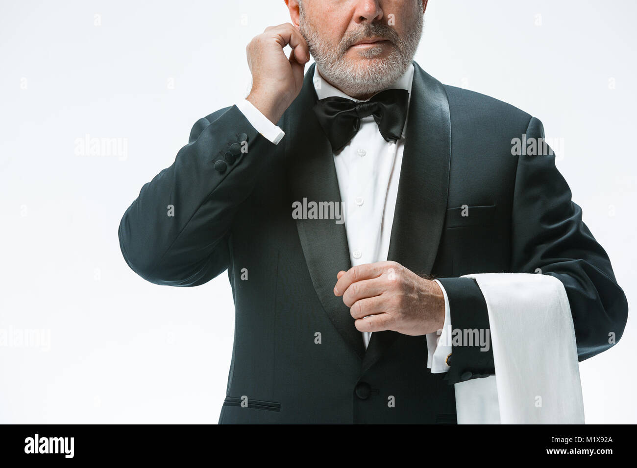 Senior waiter with white towel. Sign language in the restaurant Stock ...
