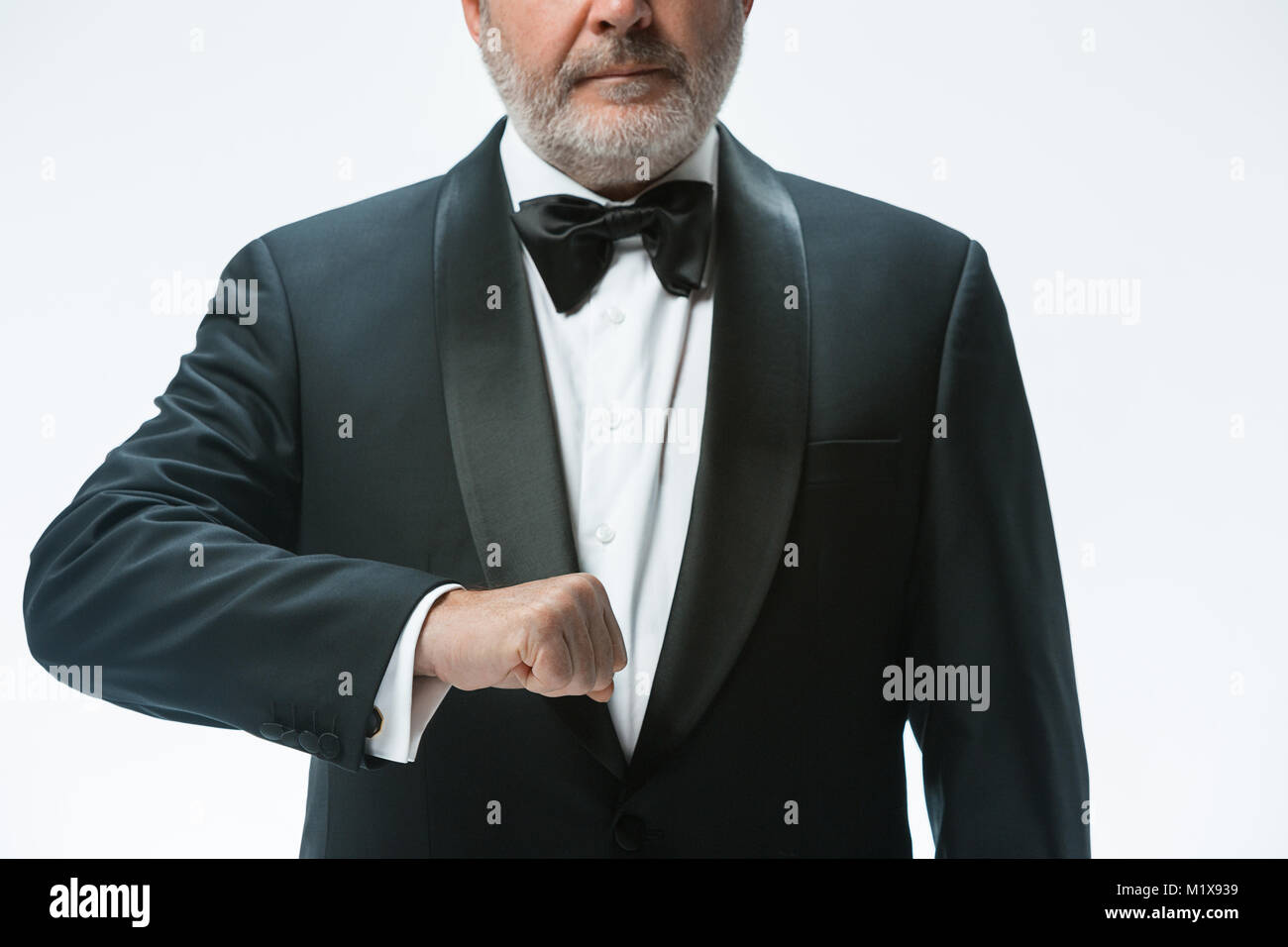 Senior waiter with white towel. Sign language in the restaurant Stock ...