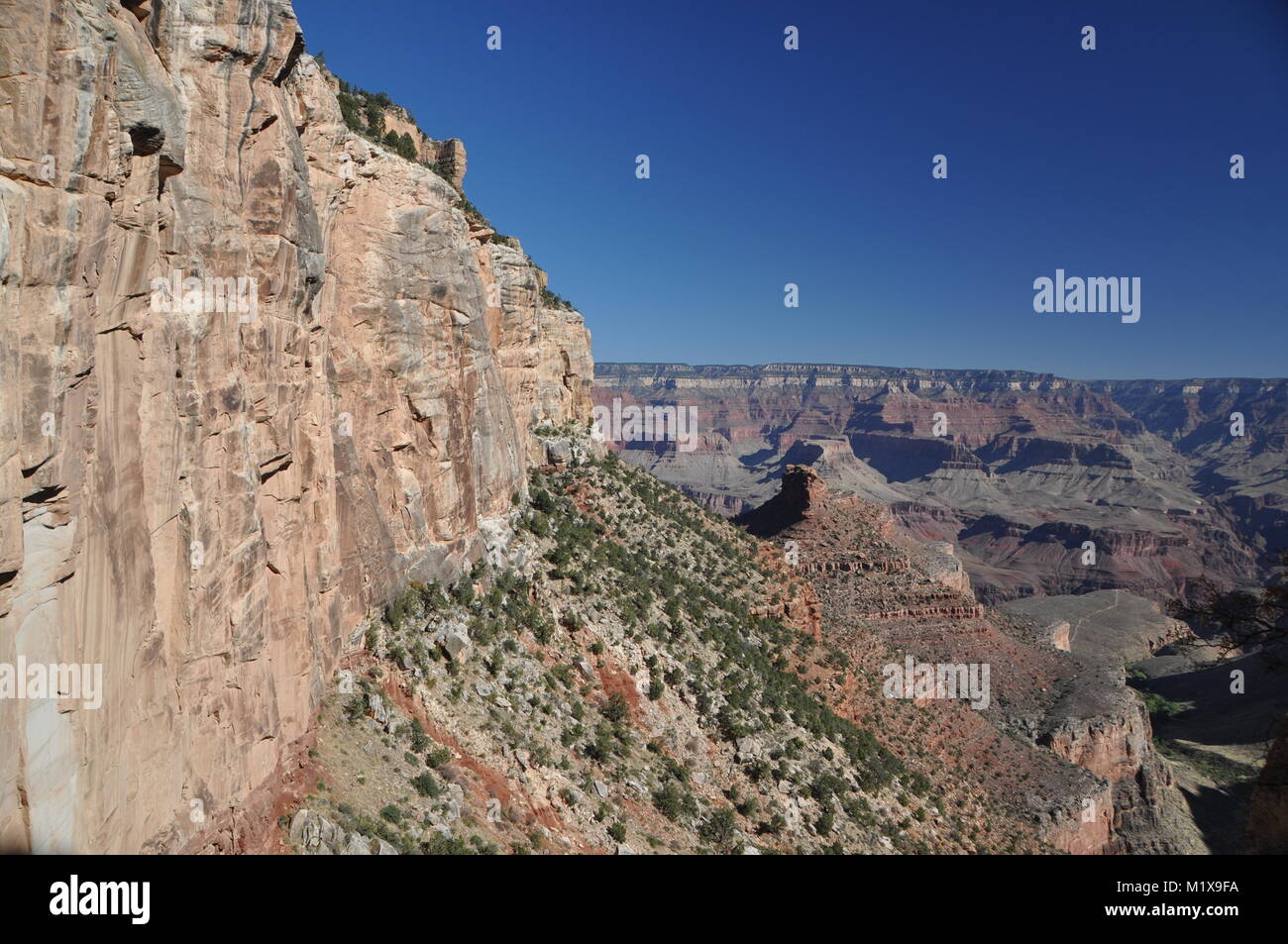 Coconino Sandstone cliff frames the Grand Canyon as seen from the ...