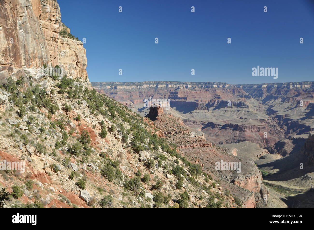 Coconino Sandstone cliff frames the Grand Canyon as seen from the ...
