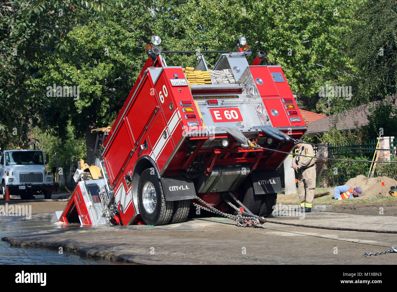 A Los Angeles Fire Department fire engine plunged into a sink hole in ...
