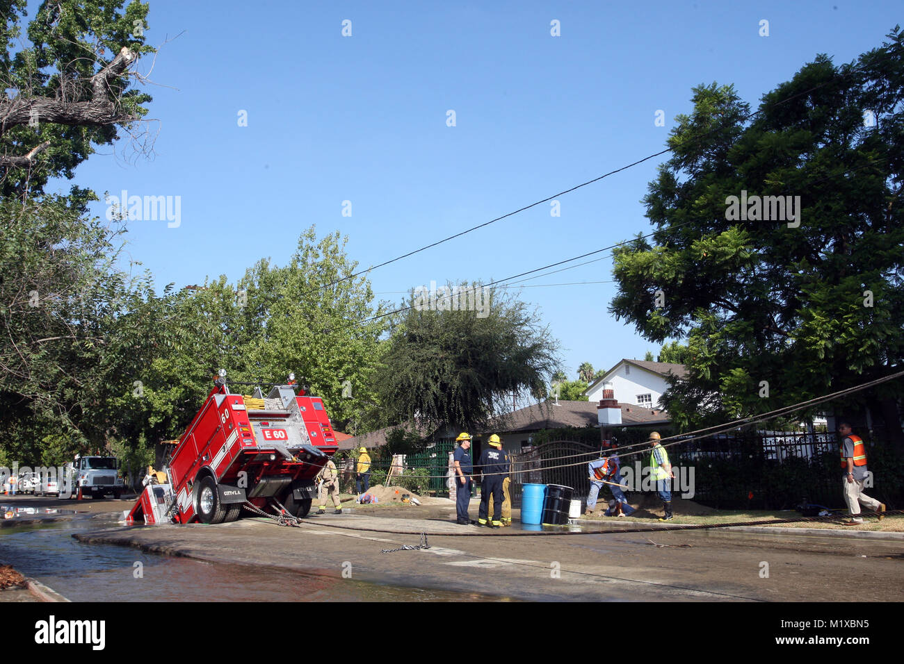 A Los Angeles Fire Department fire engine plunged into a sink hole in ...