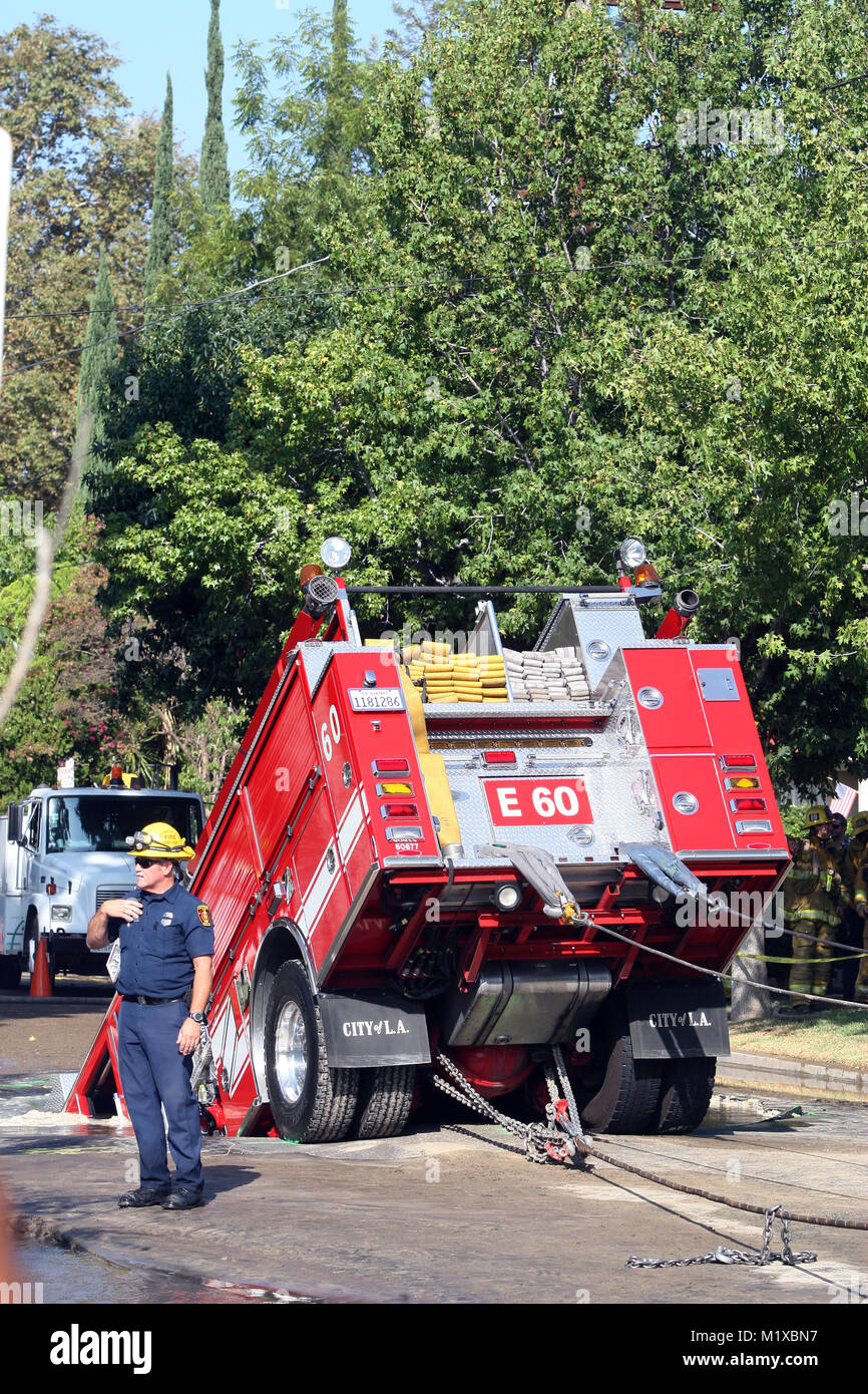 A Los Angeles Fire Department fire engine plunged into a sink hole in ...