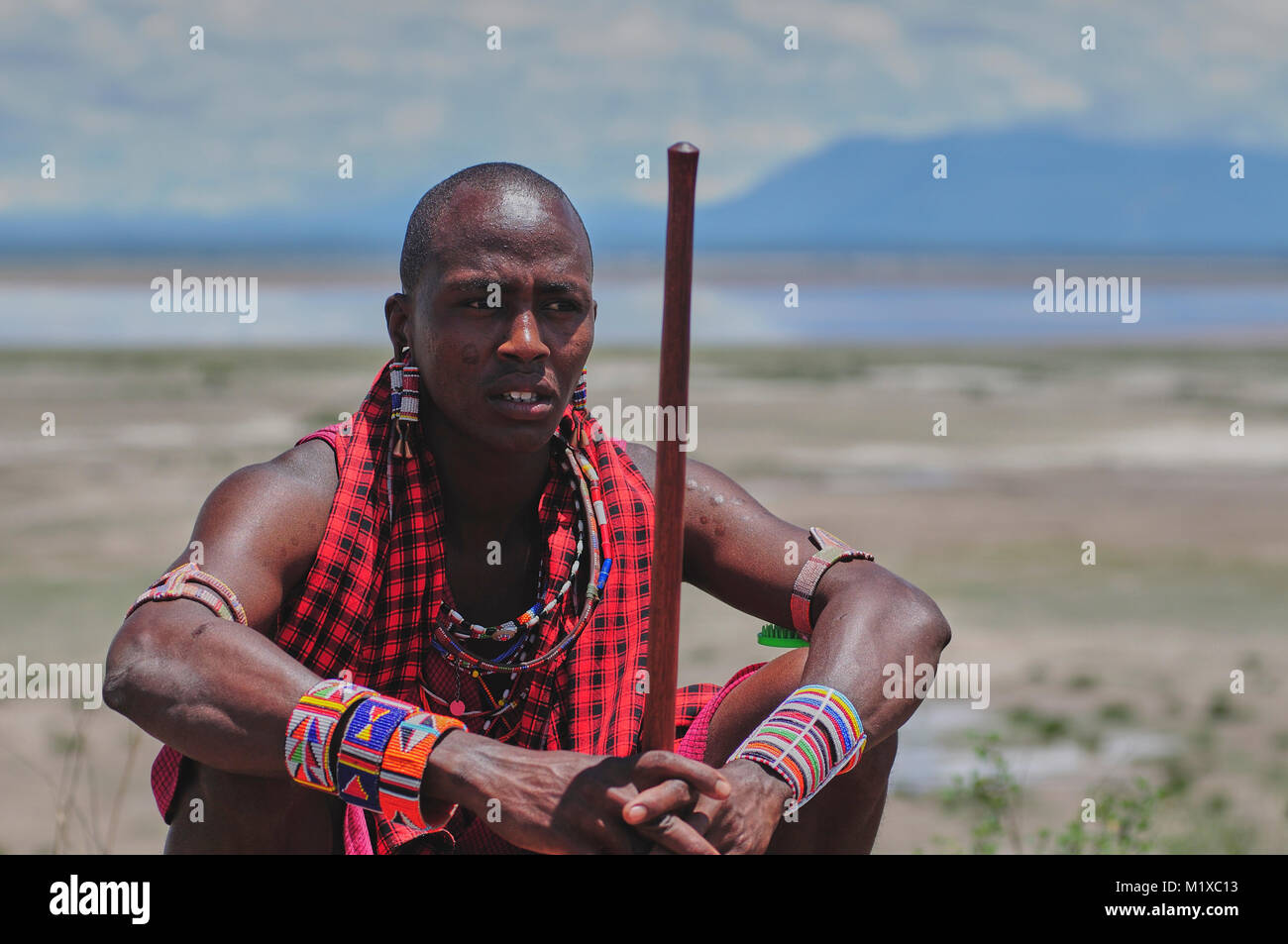 Young Maasai Warrior (Moran) wearing traditional clothing. Amboseli ...