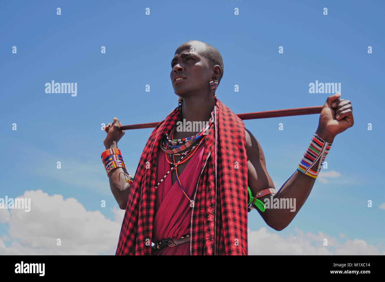Young Maasai Warrior (Moran) wearing traditional clothing. Amboseli ...