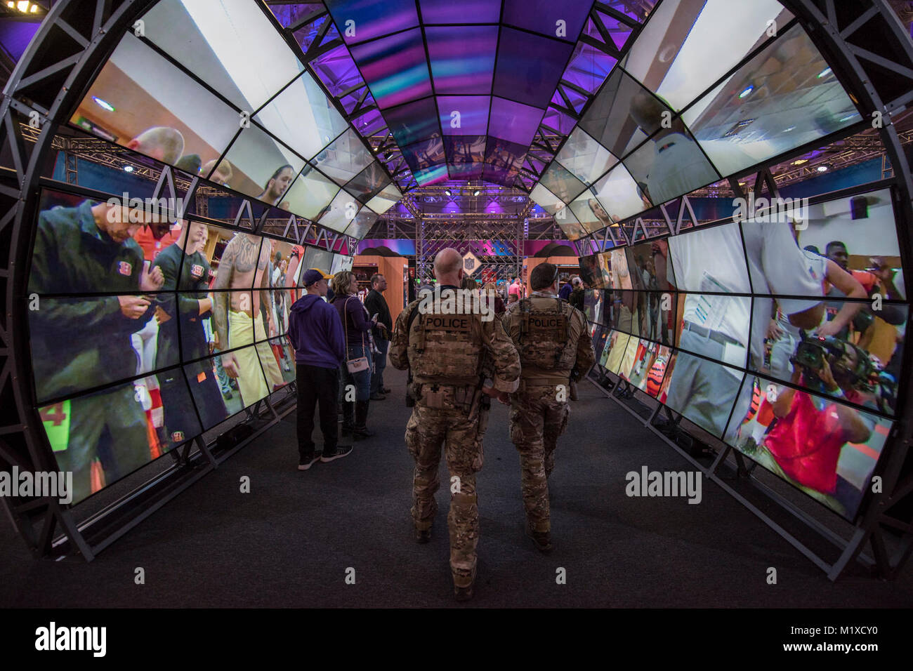 Two SRT members patrol the Super Bowl Experience. SRTs are trained to ...